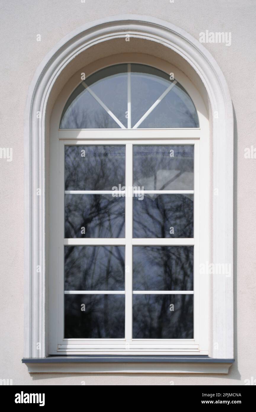 Beautiful arched window in building, view from outdoors Stock Photo - Alamy
