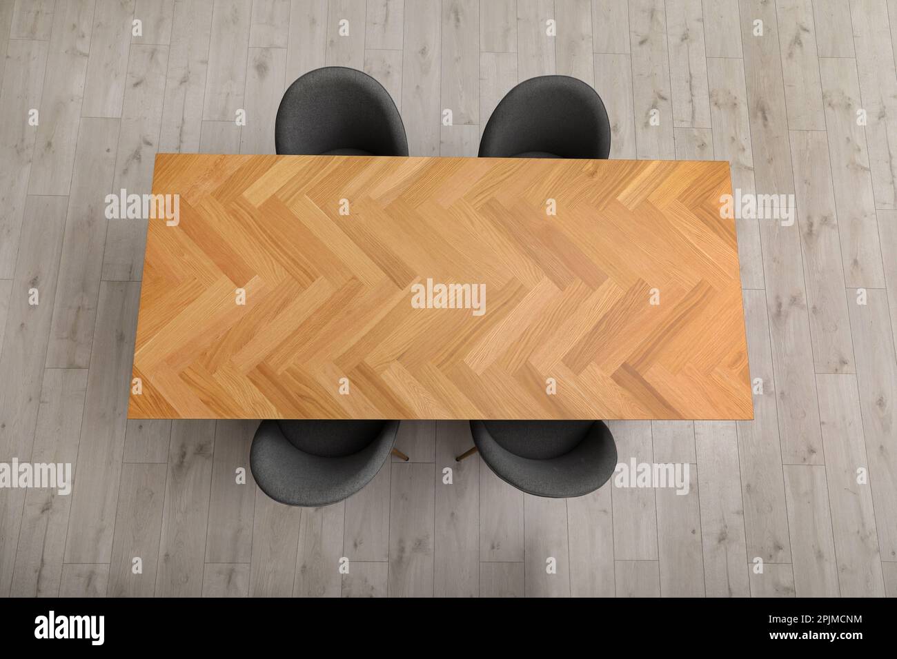 Wooden table and grey chairs indoors, top view Stock Photo - Alamy