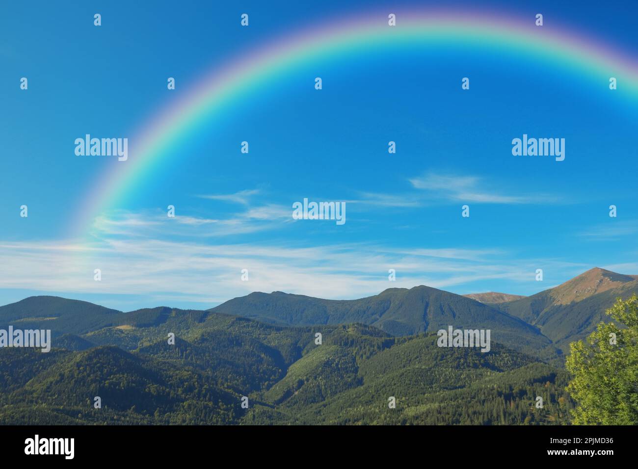Picturesque mountain landscape and beautiful rainbow in blue sky Stock ...