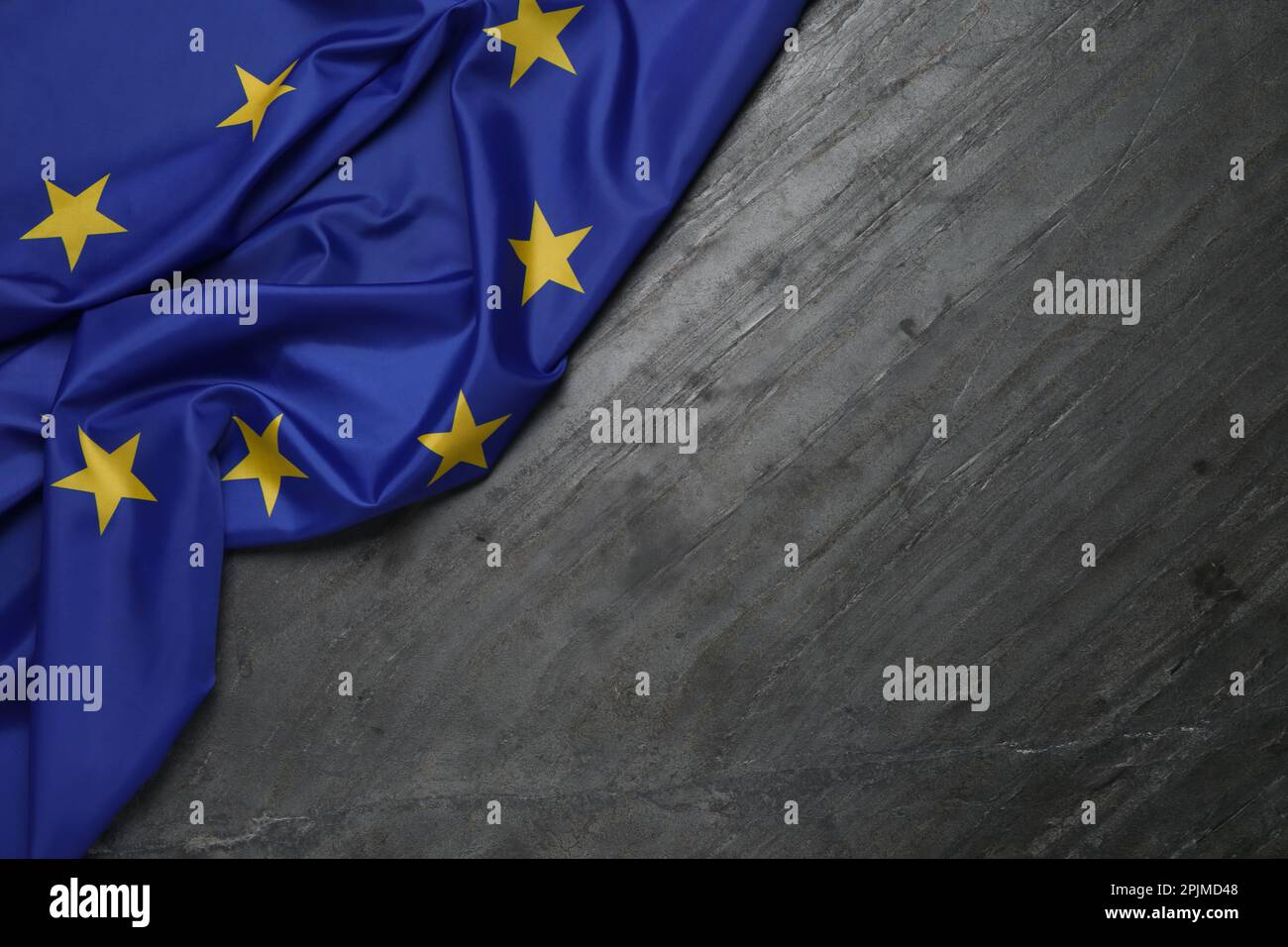 Flag of European Union on grey table, top view. Space for text Stock ...