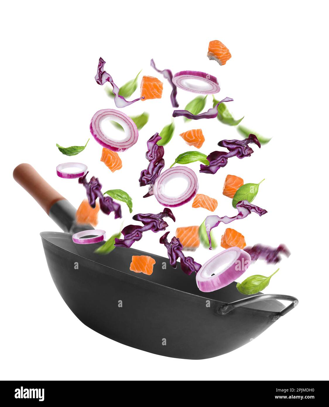 Different tasty ingredients falling into wok on white background Stock ...