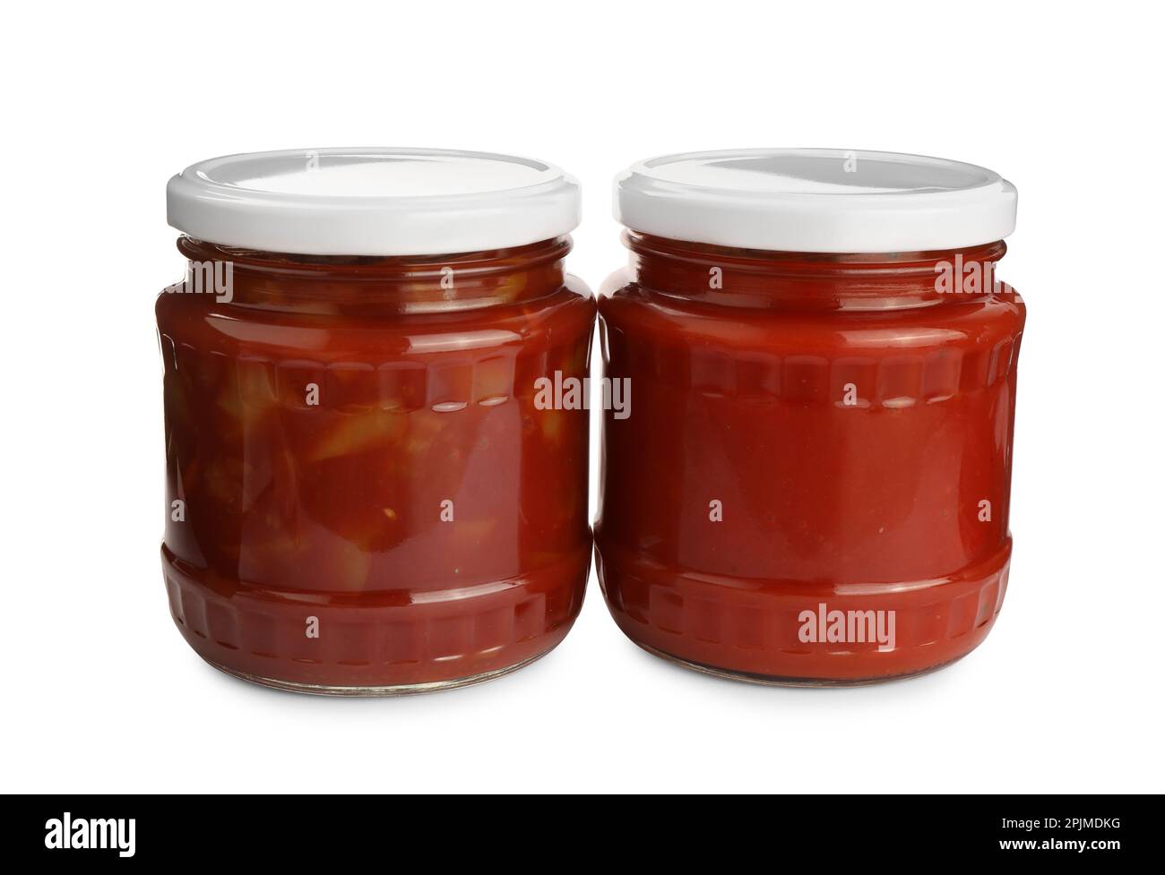 Glass jars of delicious canned lecho on white background Stock Photo ...