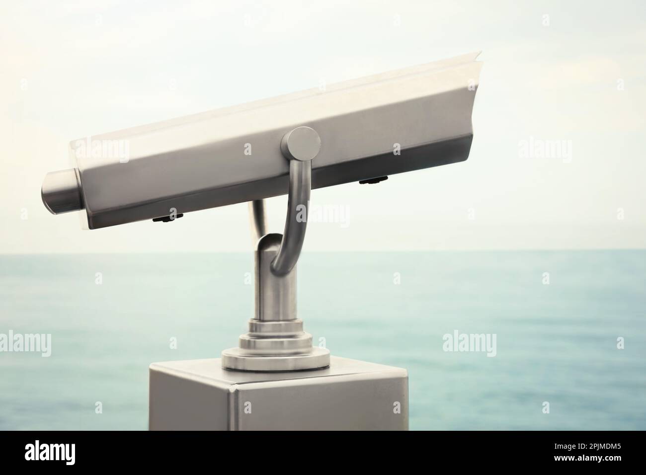 Metal tower viewer installed near sea. Mounted binoculars Stock Photo ...