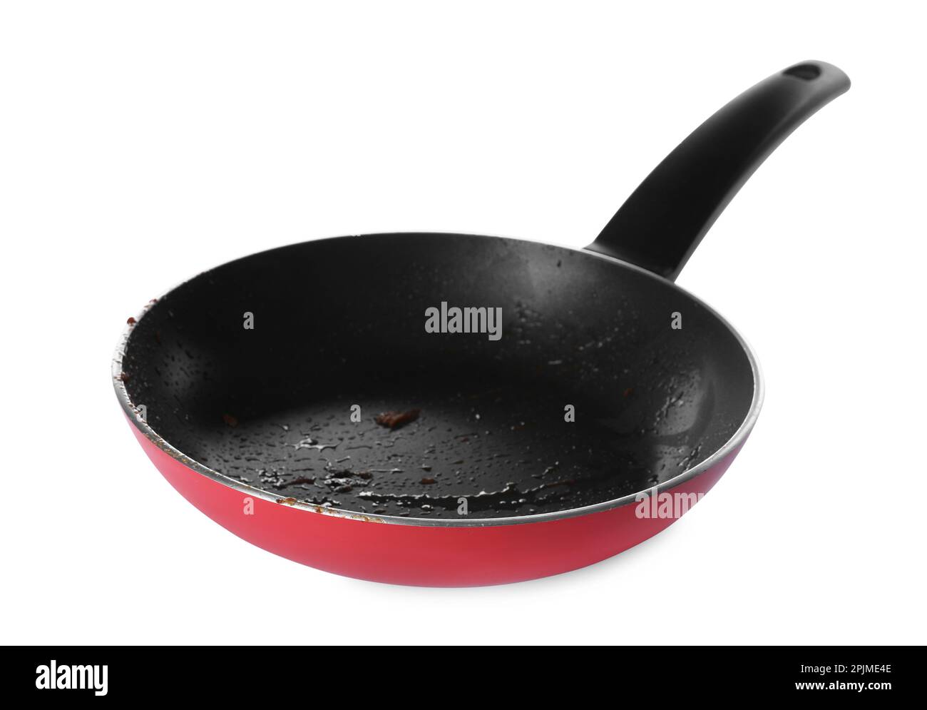 Dirty red frying pan isolated on white Stock Photo - Alamy