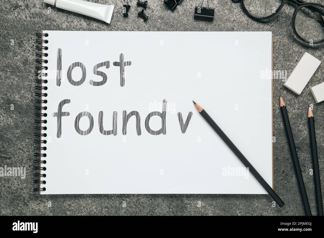Flat lay composition with blank sketchbook with words Lost and Found on ...