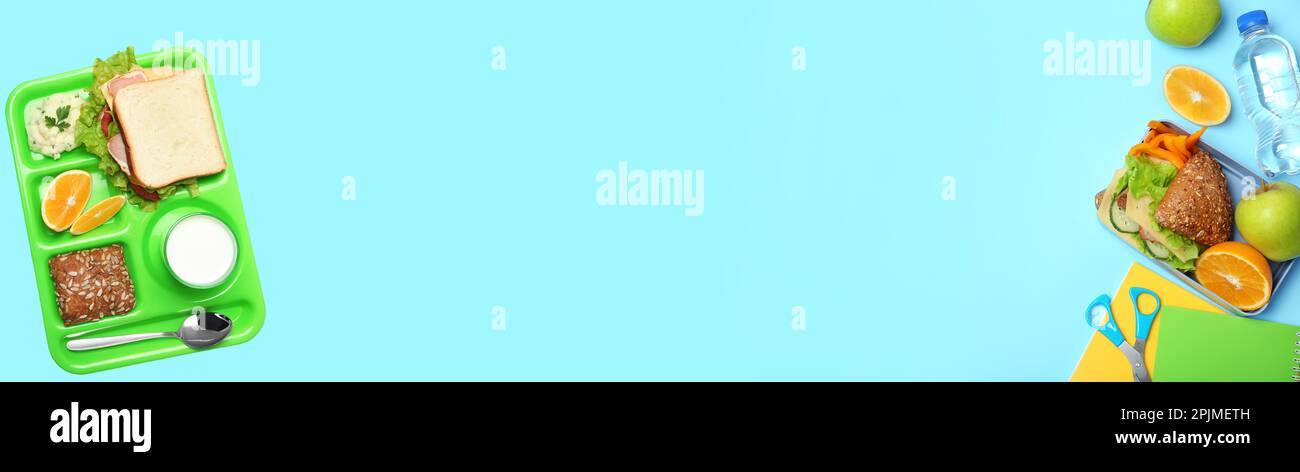 Flat lay composition with tasty food for school on turquoise background ...