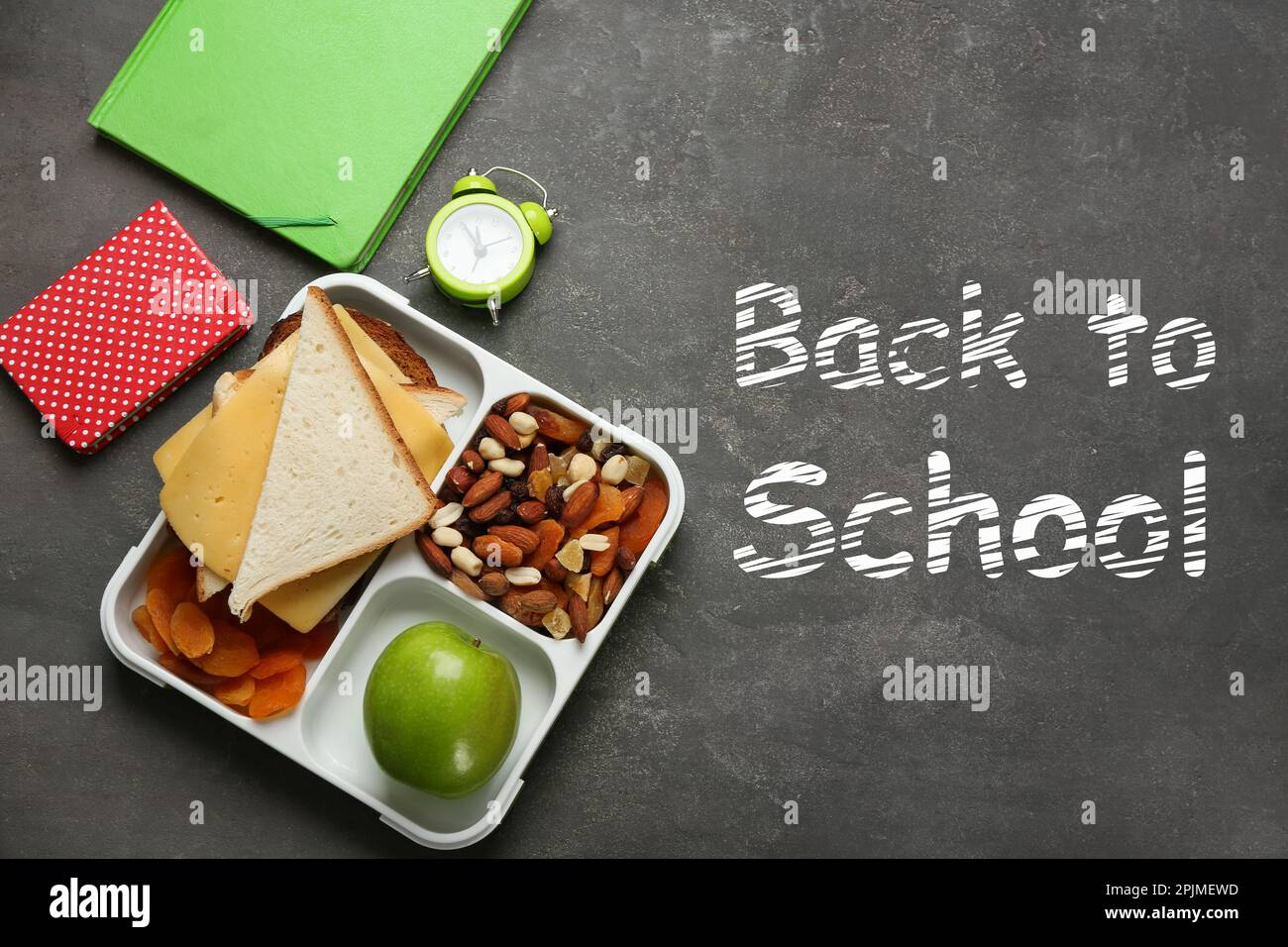 Flat lay composition with lunch box and appetizing food for school on ...