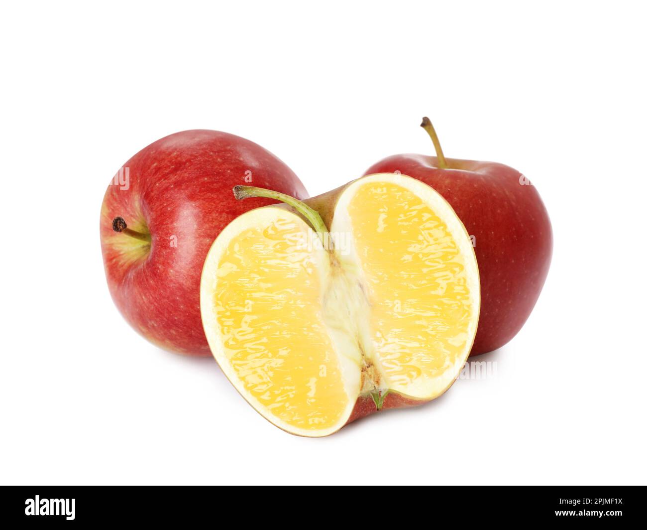 Genetically modified apples with lemon on white background Stock Photo ...