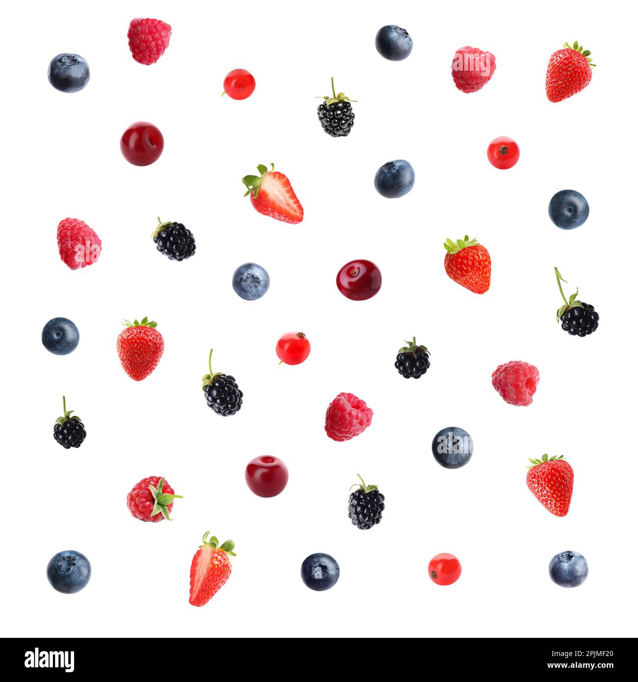 Different tasty ripe berries falling on white background Stock Photo ...