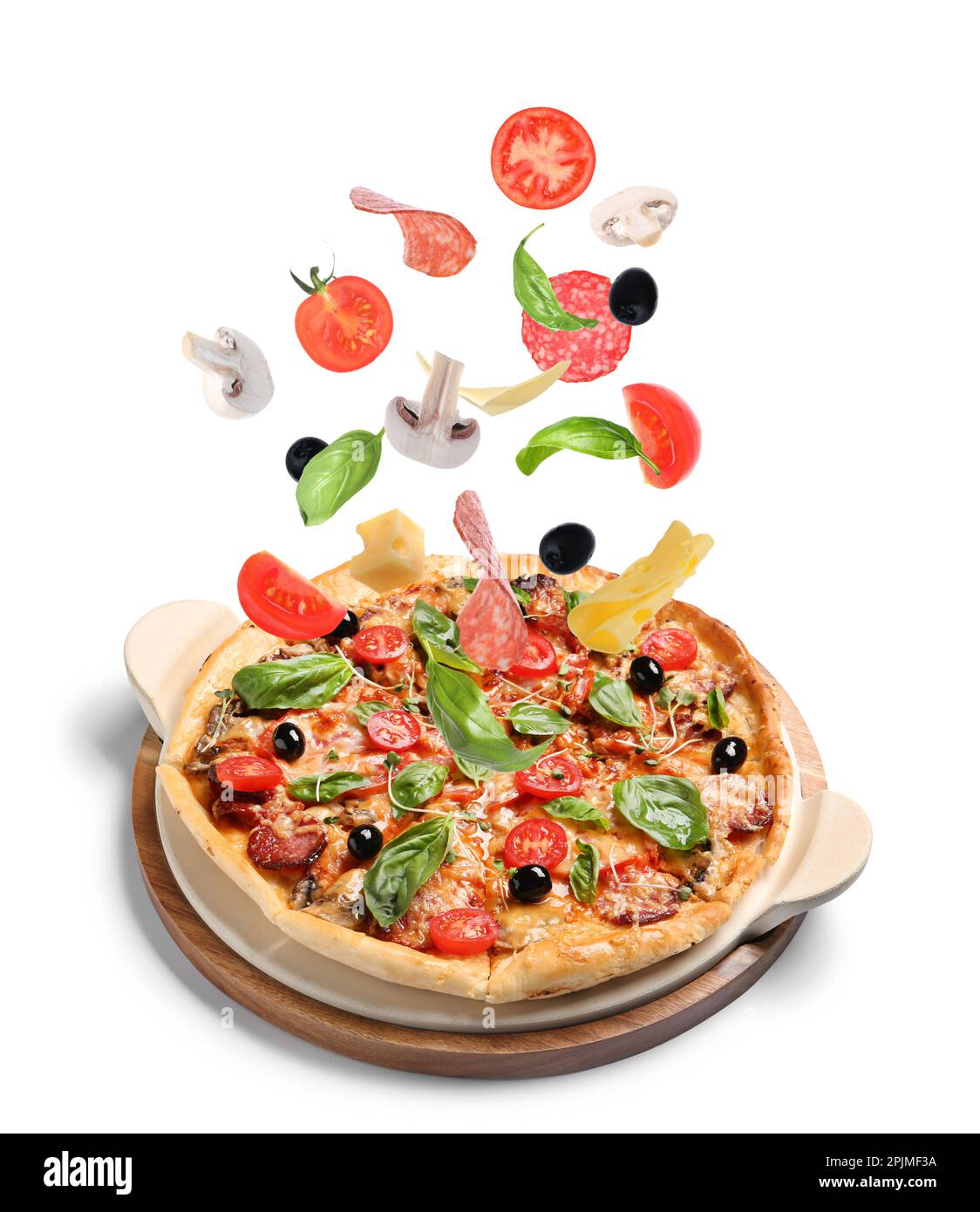 Delicious pizza and flying ingredients on white background Stock Photo ...