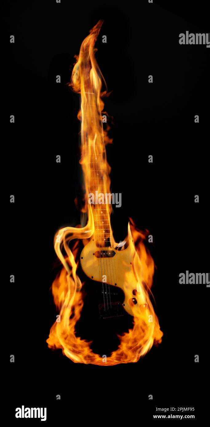 Electric guitar in flames on black background, bright design, Rock ...