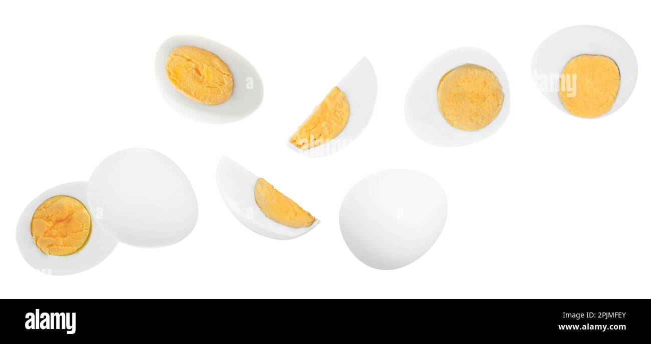 Tasty hard boiled eggs flying on white background. Banner design Stock ...