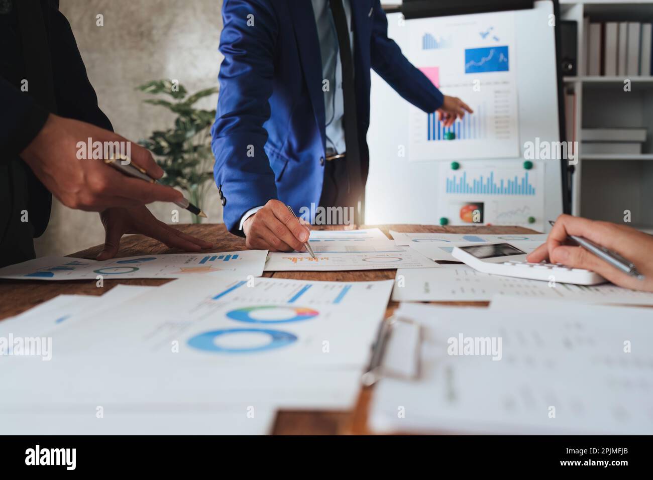 Group of Business People Meeting analysis financial plan, discussion ...