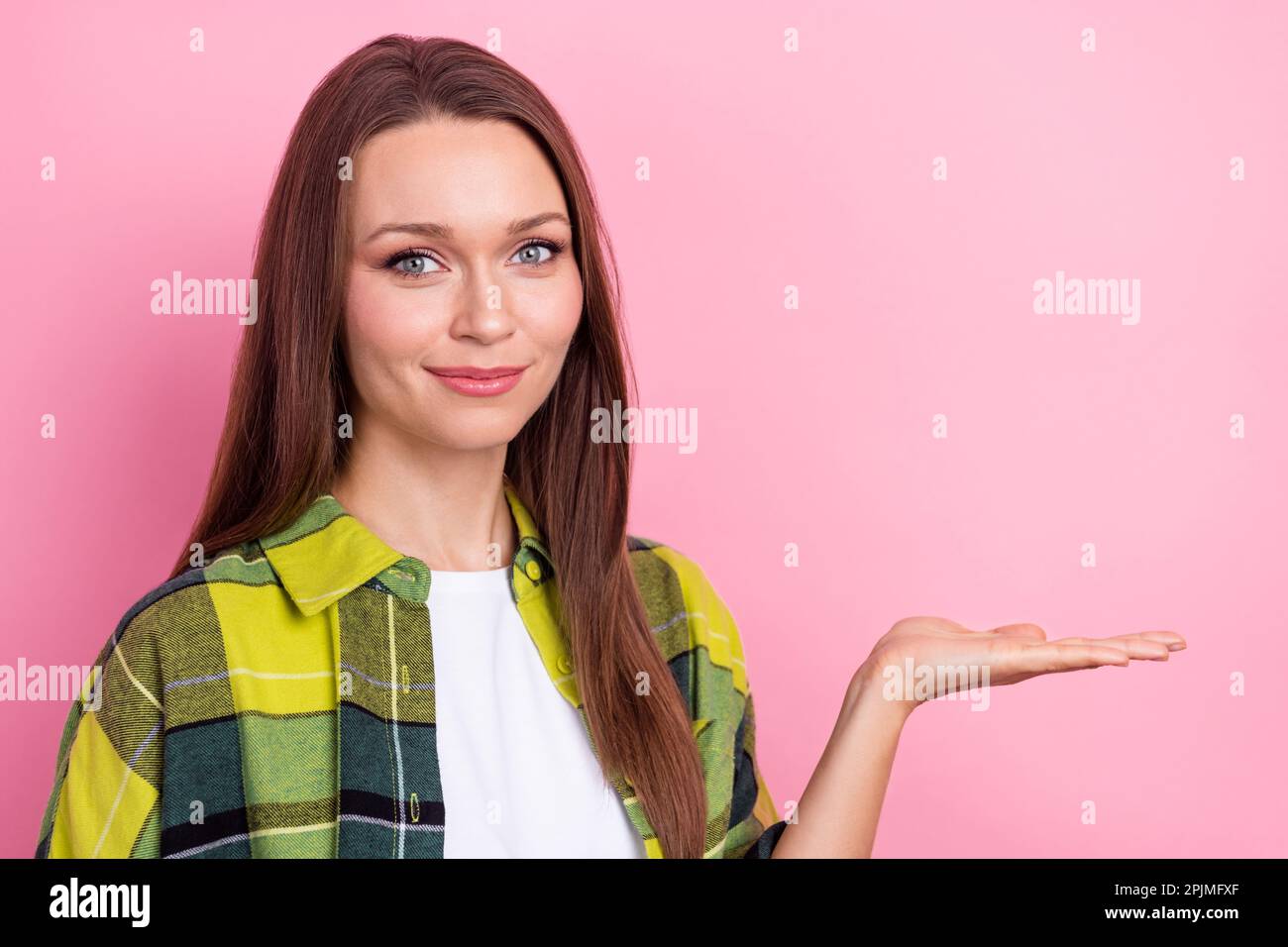 Photo of lovely positive person hand palm hold demonstrate empty space ...