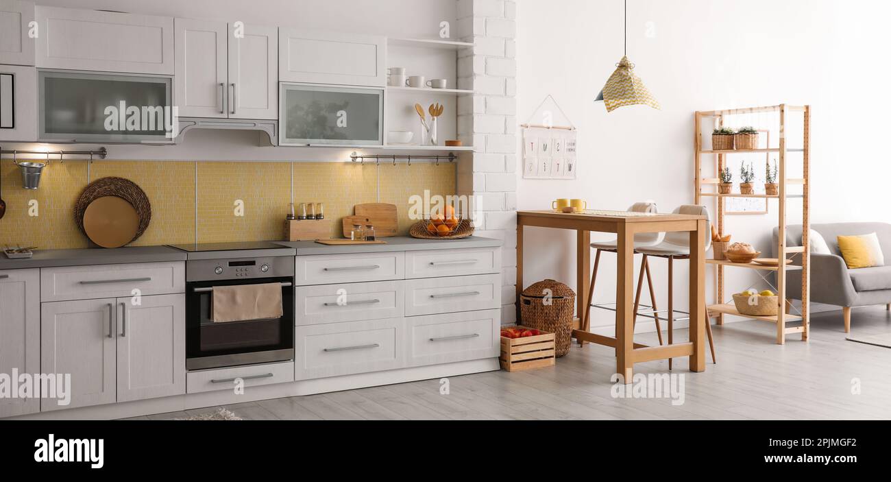 Modern kitchen interior with stylish wooden table. Banner design Stock ...