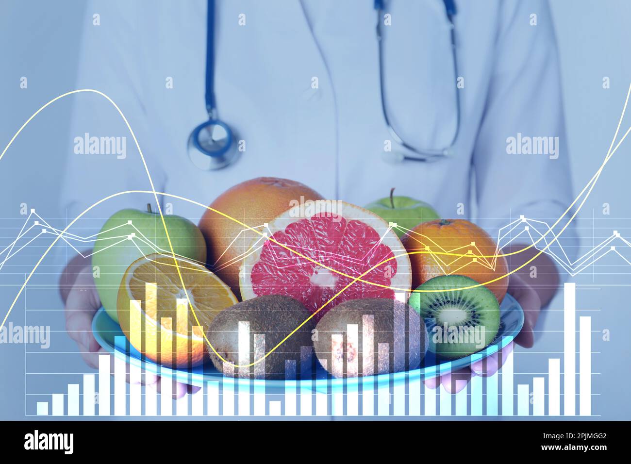 Nutritionist holding plate with ripe fruits and illustration of charts ...