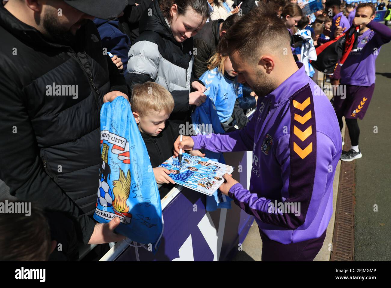 Coventry City's Matthew Godden signs for fans after training at ...