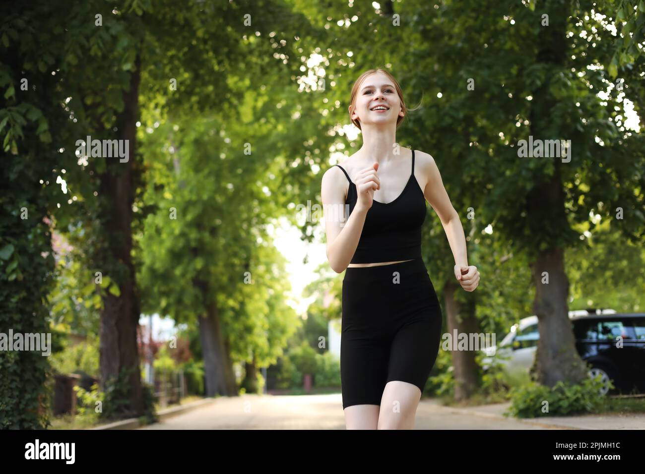Teenage girl run street hi-res stock photography and images - Alamy