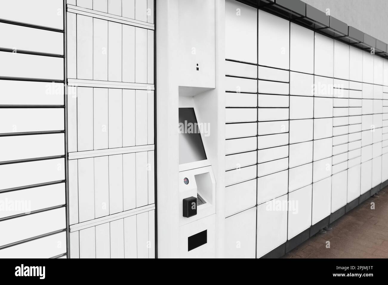 Modern parcel locker with many postal boxes Stock Photo - Alamy