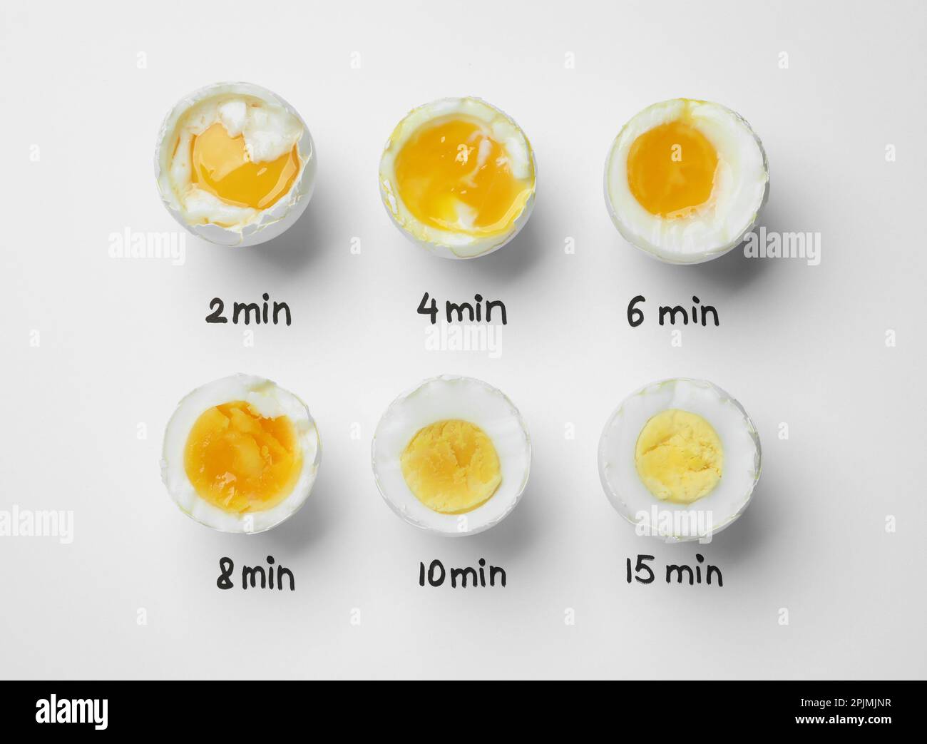 Different cooking time and readiness stages of boiled chicken eggs on ...