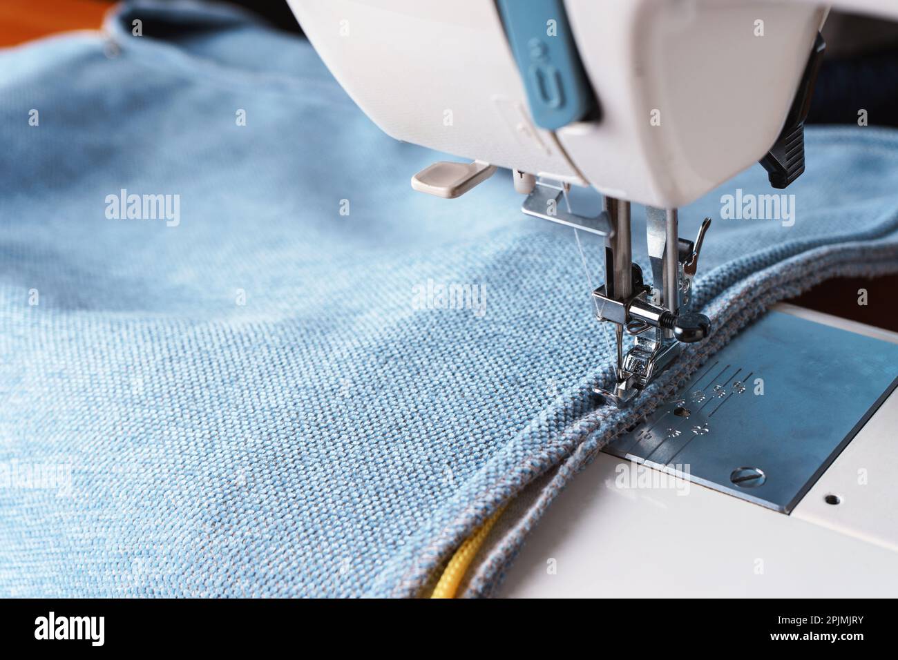 Professional equipment. Modern sewing machine with special pressure ...