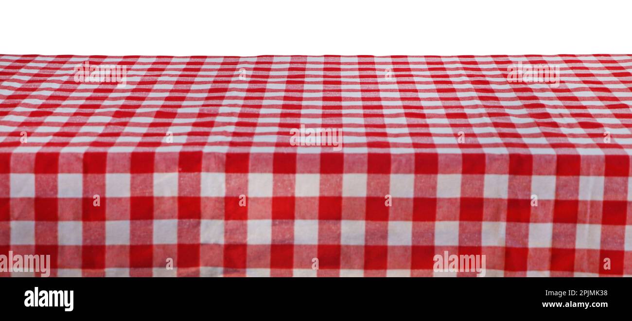 Table with checkered picnic cloth isolated on white Stock Photo - Alamy