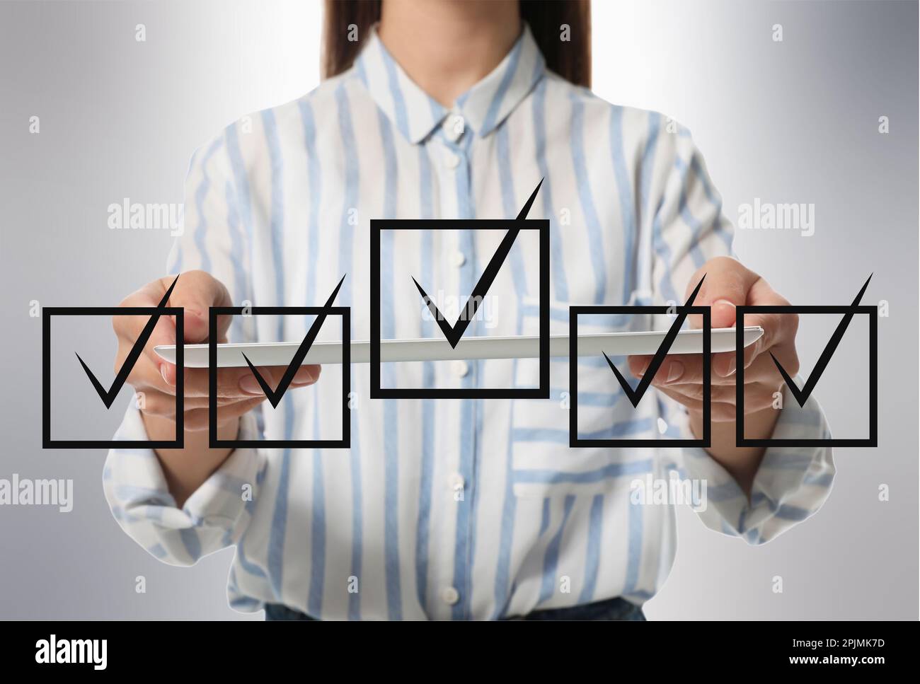 Illustration of check boxes with marks and woman holding tablet on ...