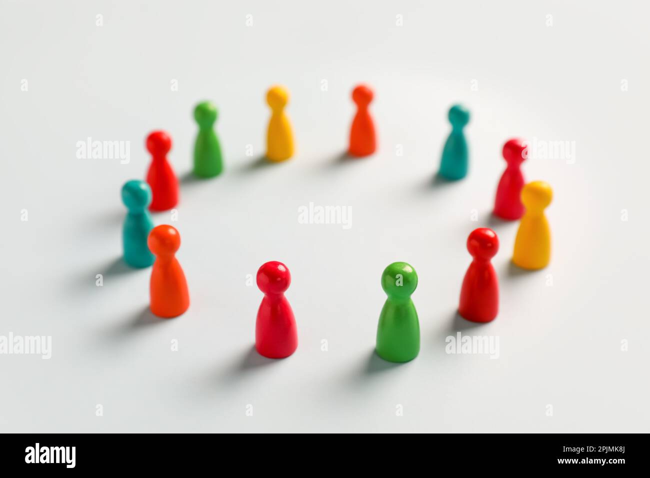 Colorful pawns on white background. Social inclusion concept Stock ...