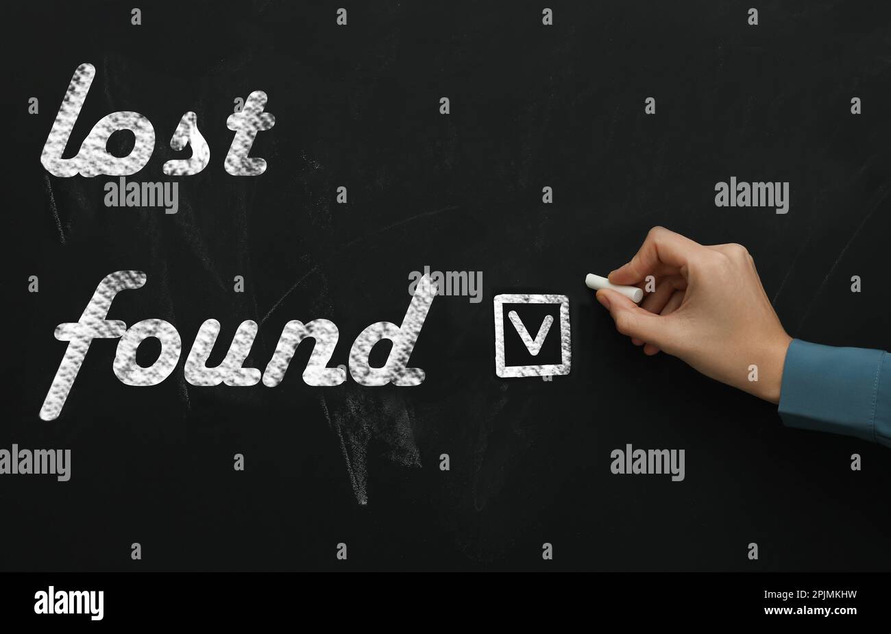 Woman write words Lost and Found on blackboard, closeup Stock Photo - Alamy