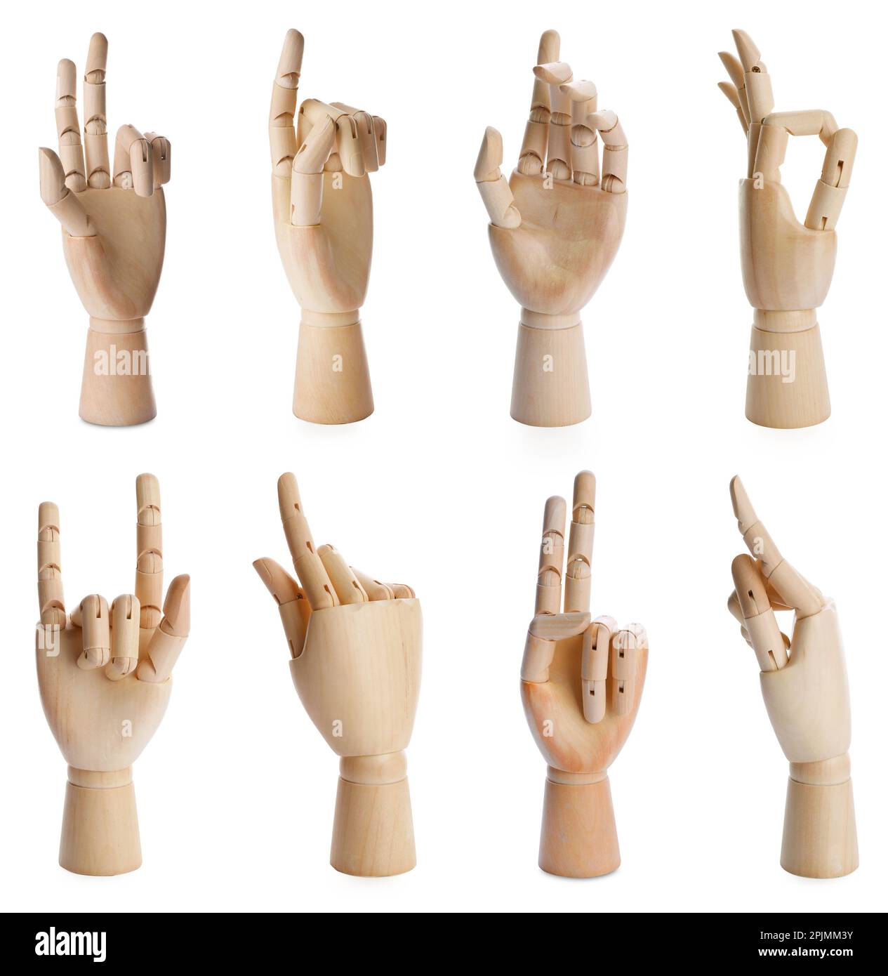 Set with wooden hands of mannequins showing different gestures on white ...