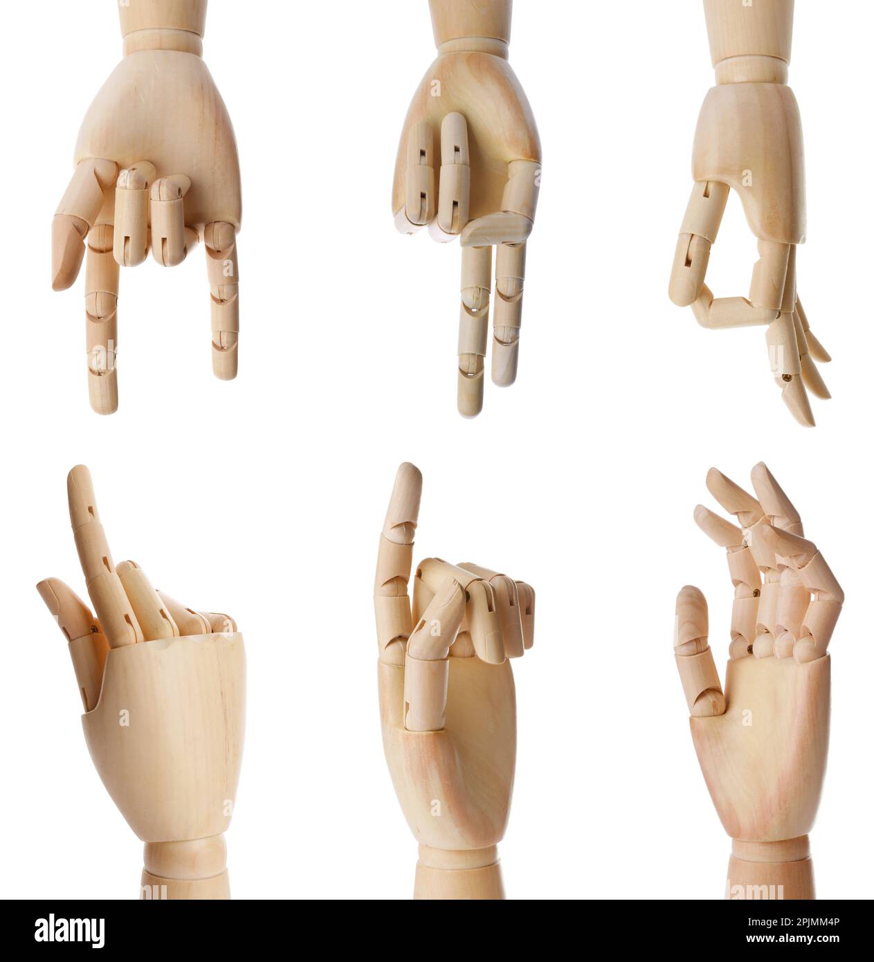 Set with wooden hands of mannequins showing different gestures on white ...