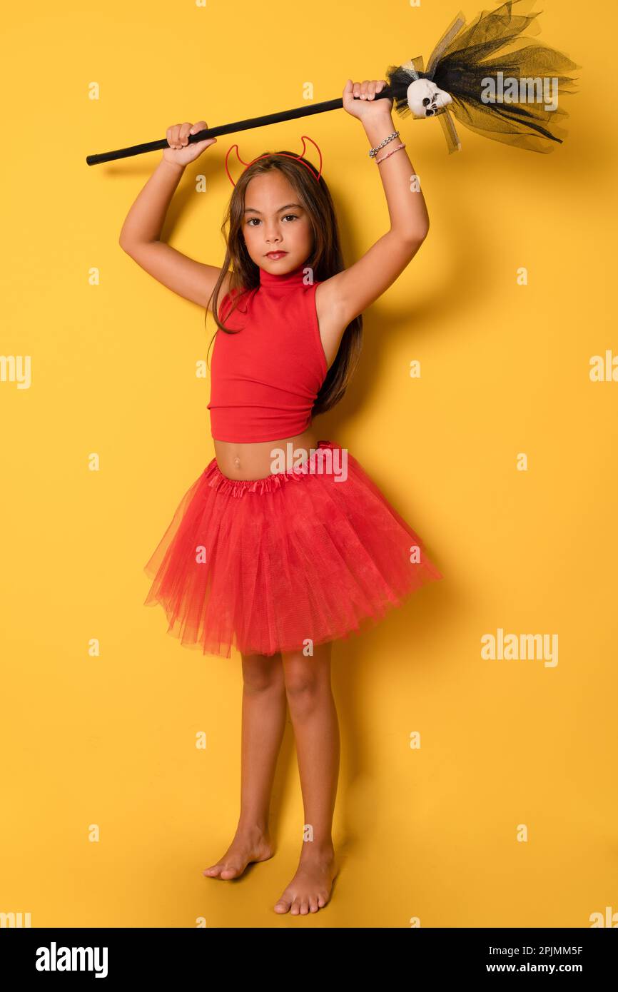 Closeup photo of funny little lady with long hair and headband playing ...