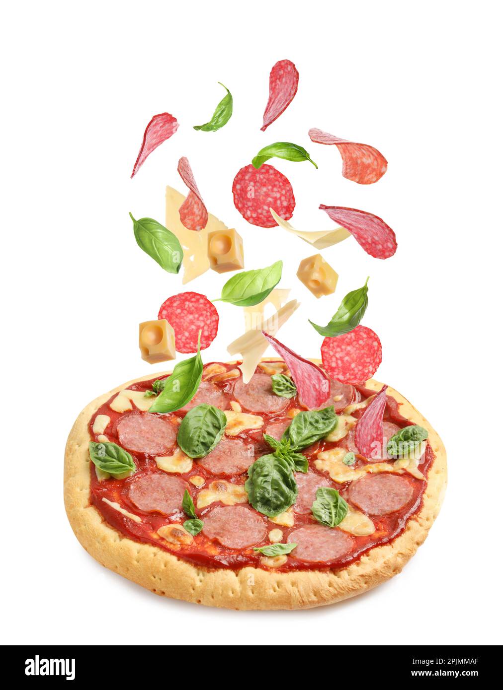 Delicious pizza and flying ingredients on white background Stock Photo ...