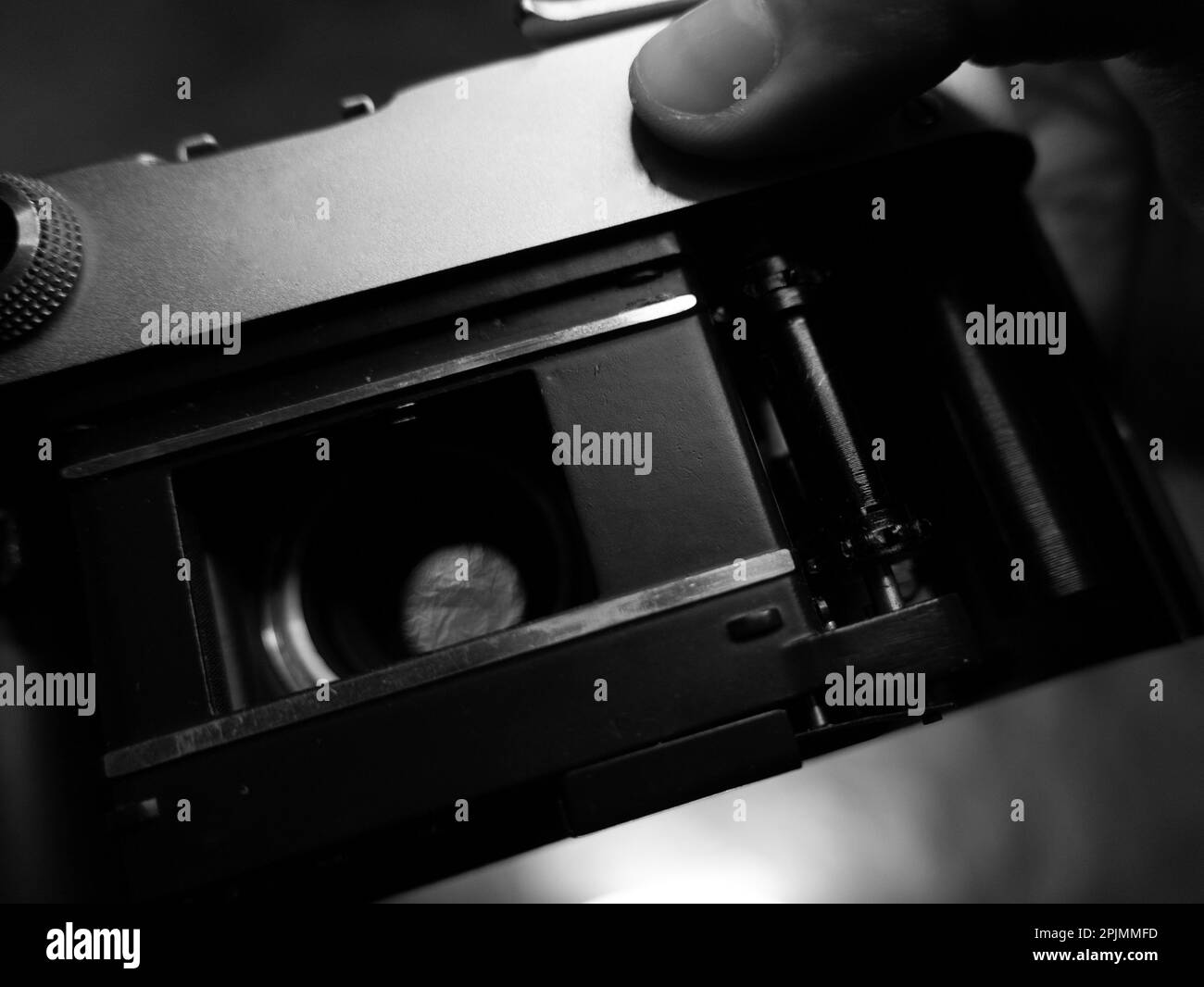 A grayscale shot of the small parts of an old vintage camera Stock ...