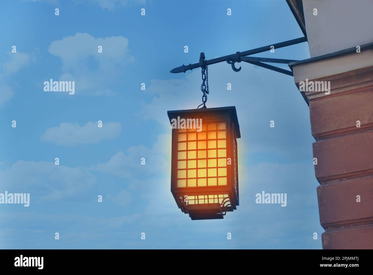 Beautiful old fashioned street lamp lighting on wall of building Stock ...