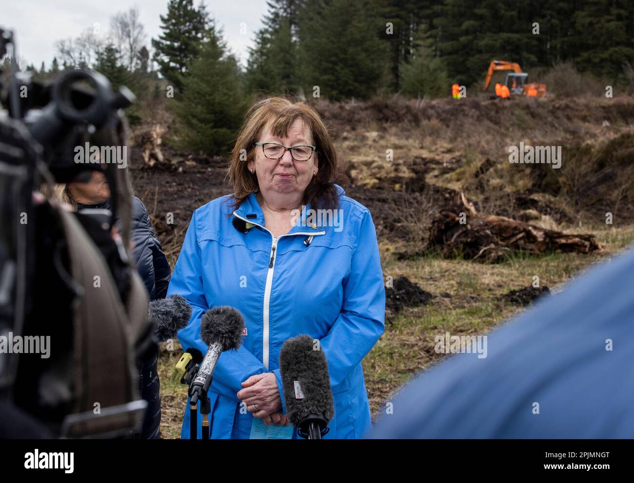 Dympna Kerr, the sister of Columba McVeigh, speaks to the media at ...