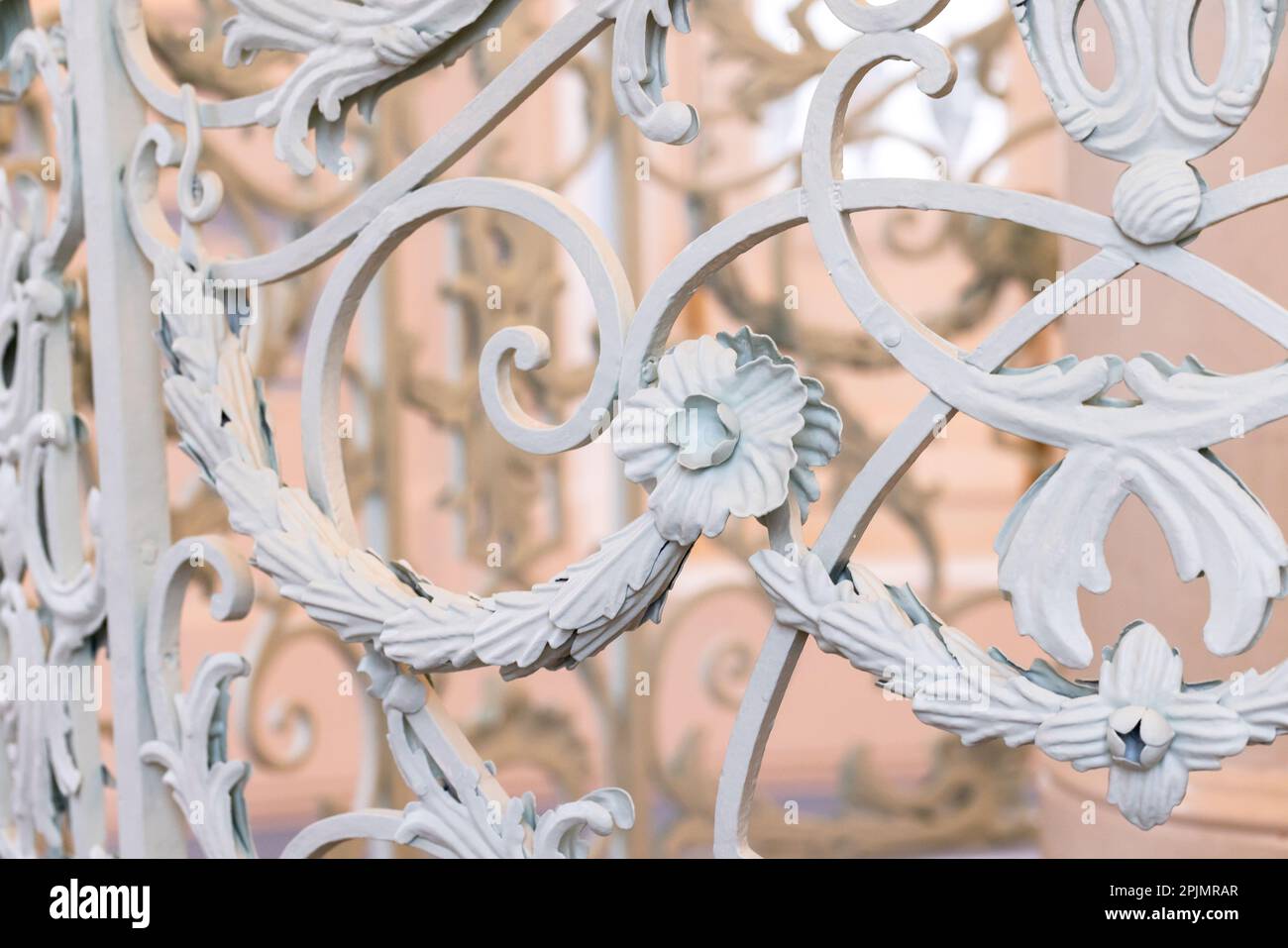 Vintage forged iron, white ornamental handrails decoration, close-up ...
