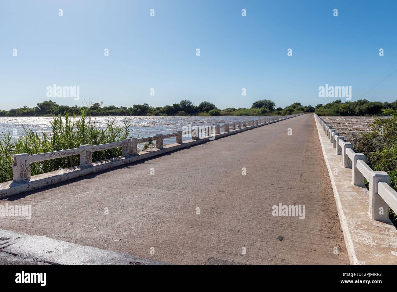 The Manie Conradie Bridge over the flooded northern channel of the ...