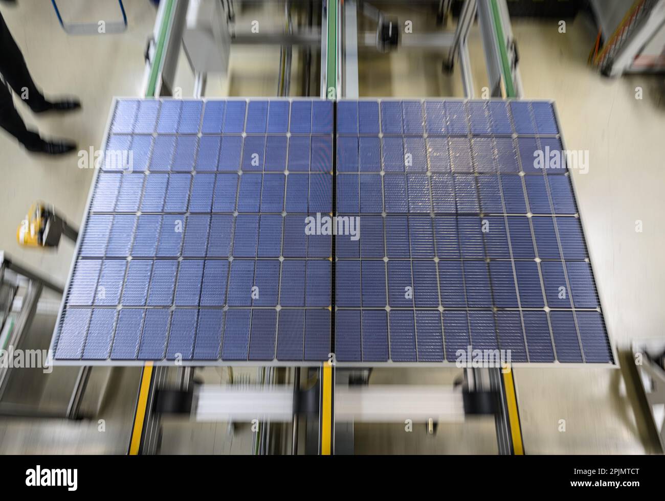 Freiberg, Germany. 03rd Apr, 2023. A solar module is transported to the ...