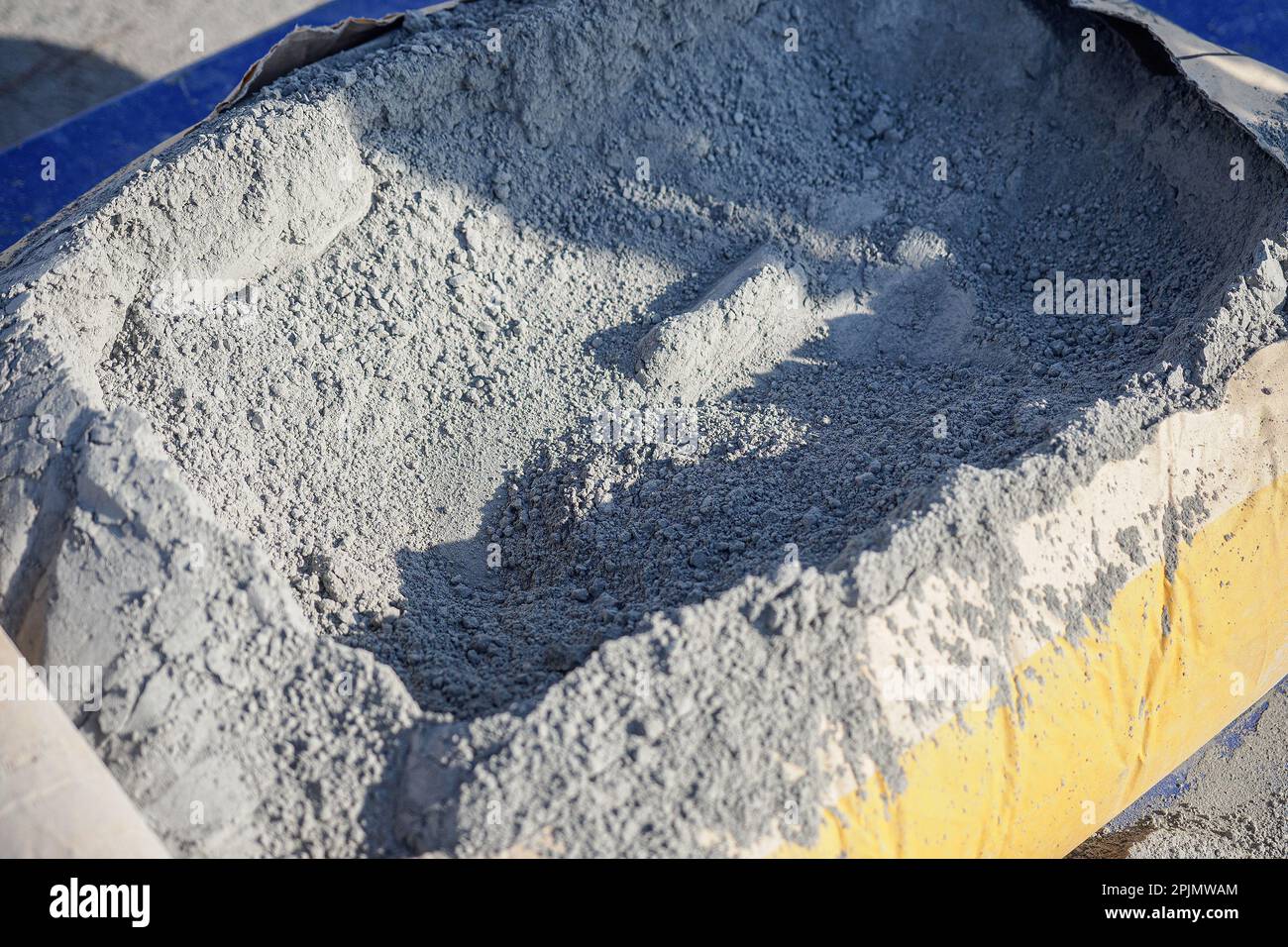 This is open bag with cement close-up. Construction and renovation ...