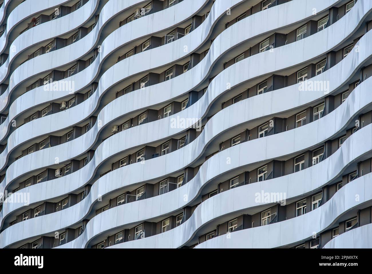 Facade of a modern apartment building. Lines patterns of facade with ...