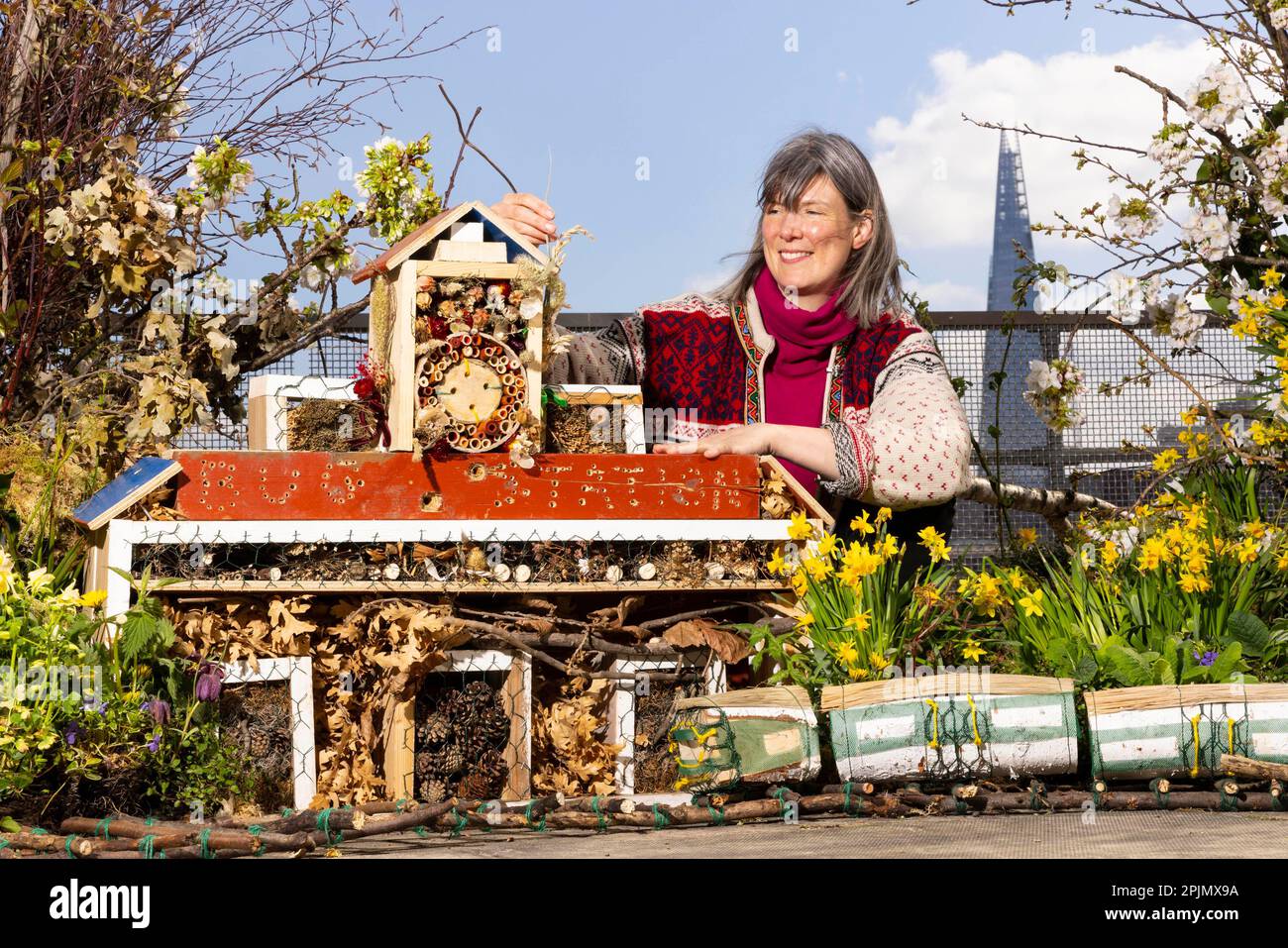 EDITORIAL USE ONLY Florist Alice McCabe puts the finishing touches to ...