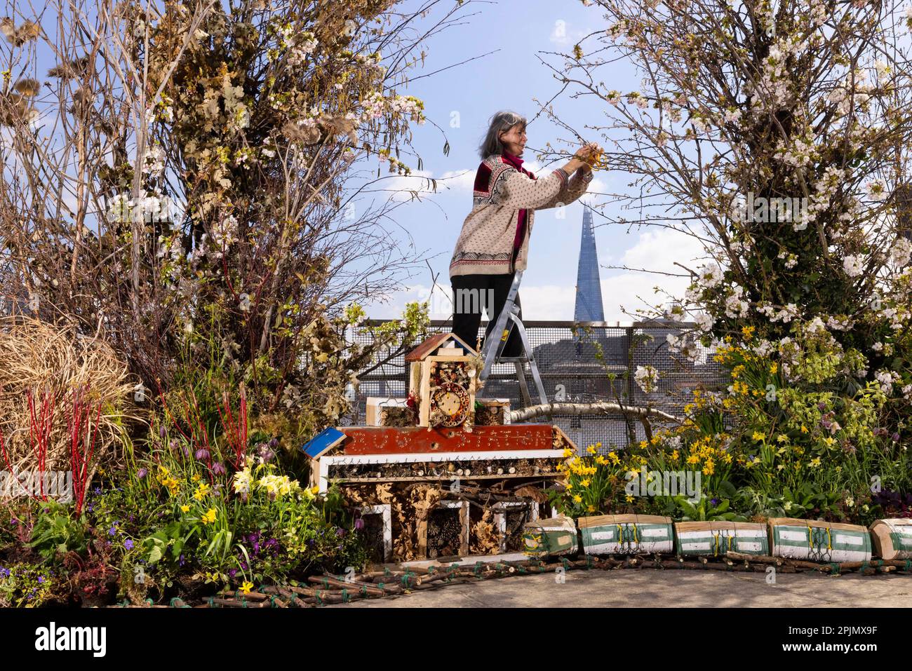 EDITORIAL USE ONLY Florist Alice McCabe puts the finishing touches to ...