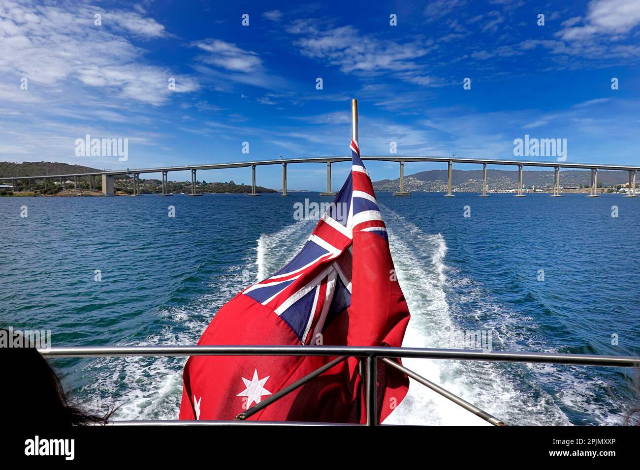 Boat journey up the Derwent river, Hobart with the Tasman Bridge behind ...
