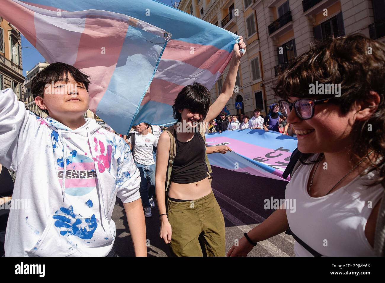 Rome, Italy. 01st Apr, 2023. Protesters carry a giant transgender flag ...