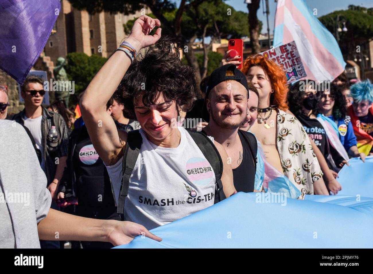 Rome, Italy. 01st Apr, 2023. Protesters carry a giant transgender flag ...