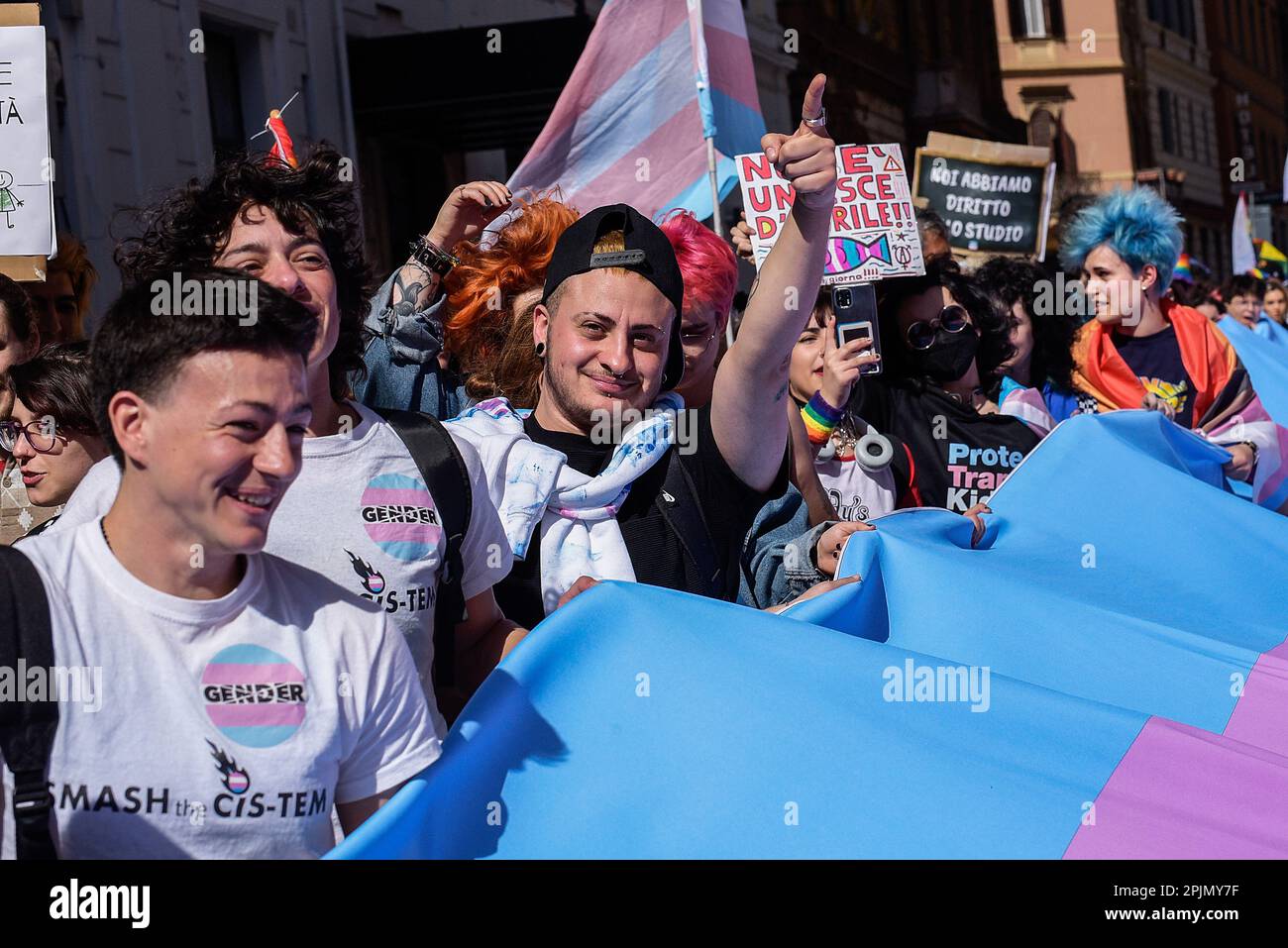 Rome, Italy. 01st Apr, 2023. Protesters carry a giant transgender flag ...
