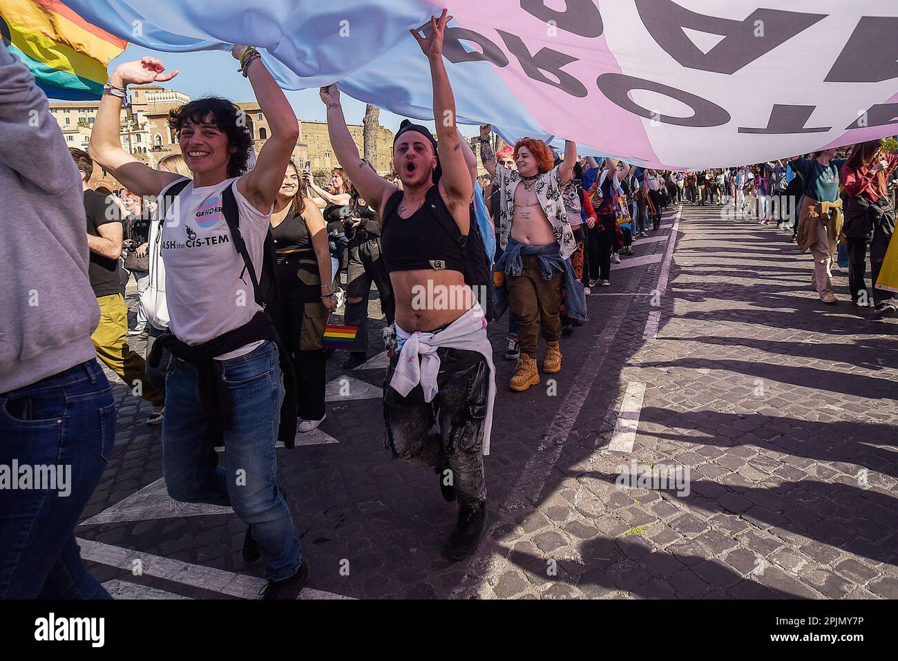 Rome, Italy. 01st Apr, 2023. Protesters carry a giant transgender flag ...