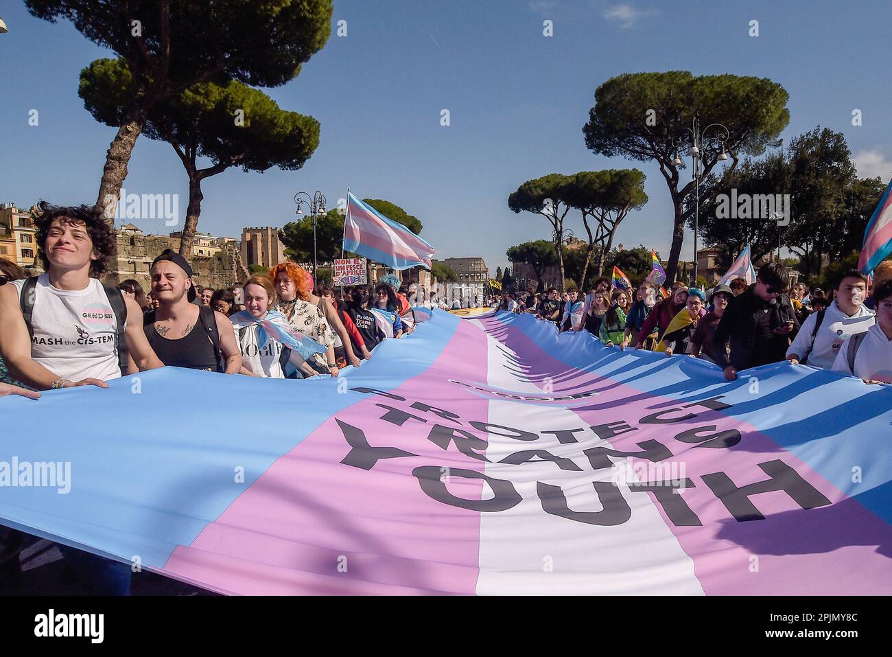 Rome, Italy. 01st Apr, 2023. Protesters carry a giant transgender flag ...