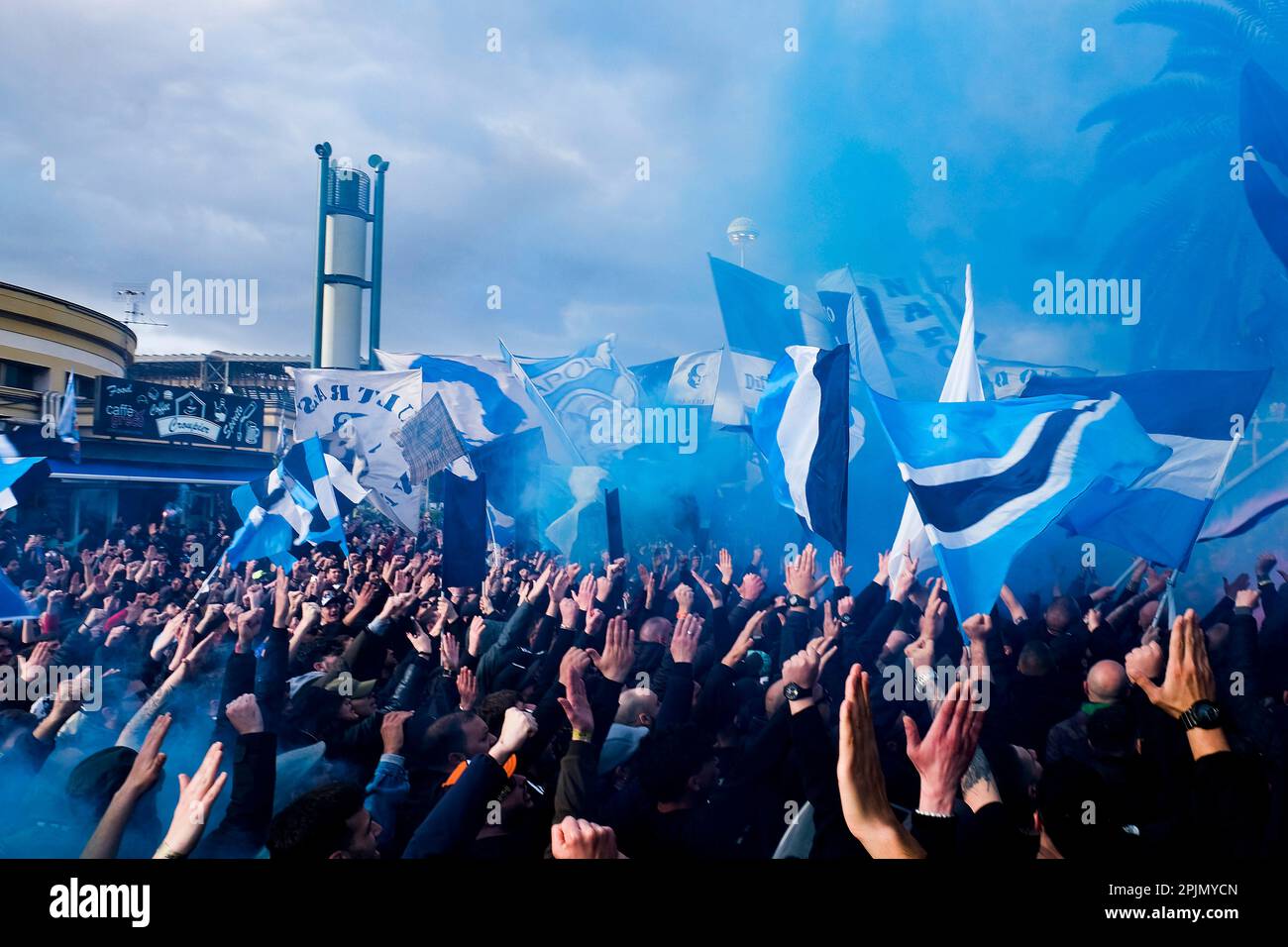 Napoli Ultras outside the stadium with flags and smoke bombs beyond the ...